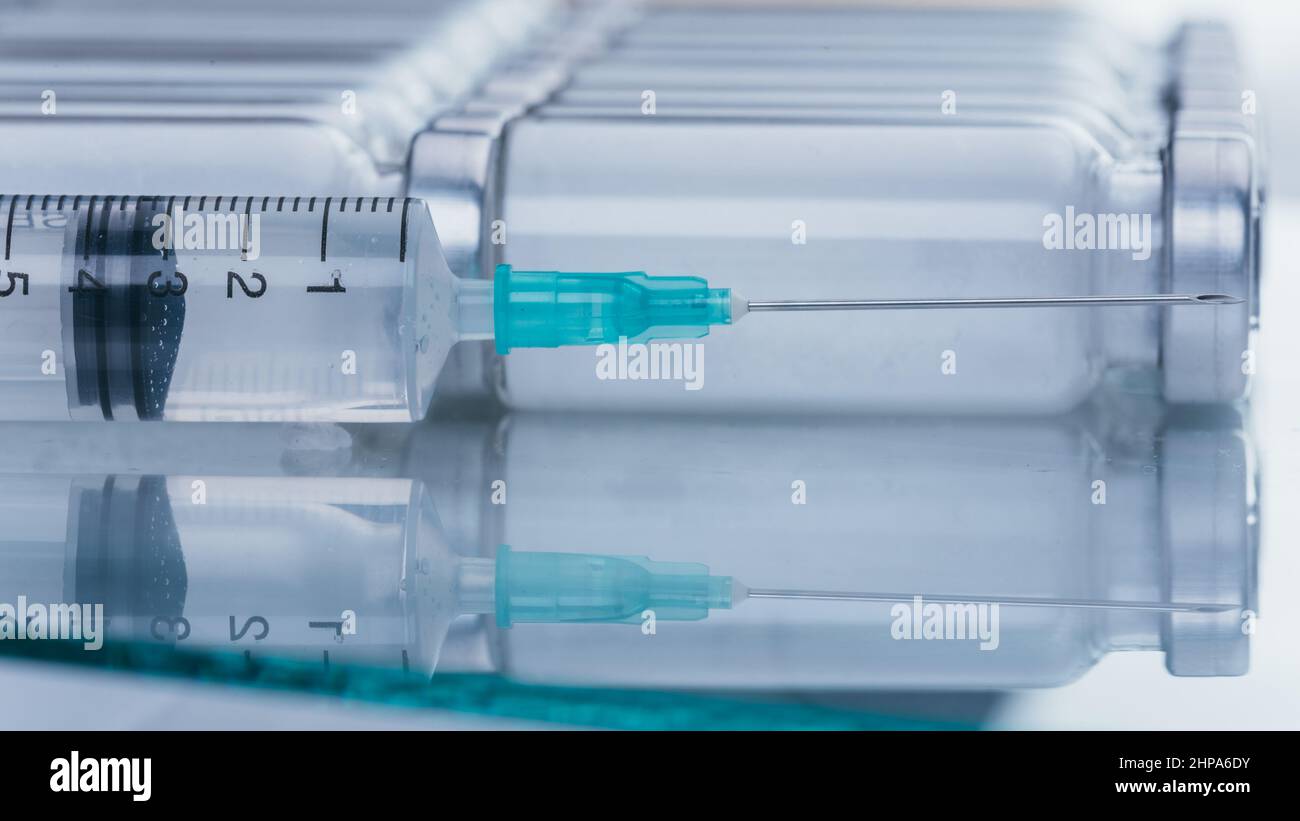 Medicine, Injection, vaccine and disposable syringe, drug concept ...