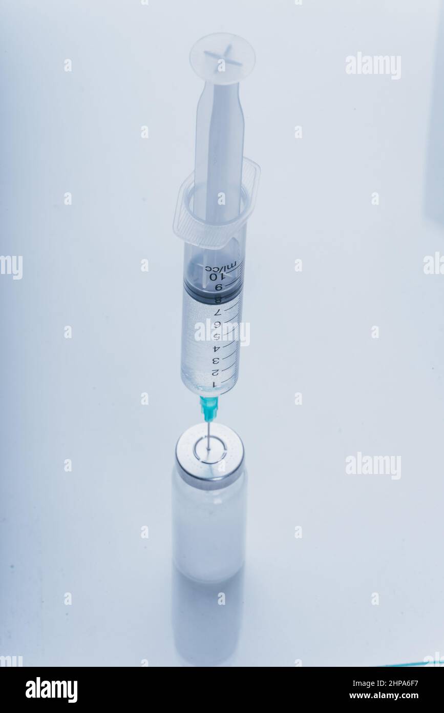 Medicine, Injection, vaccine and disposable syringe, drug concept ...