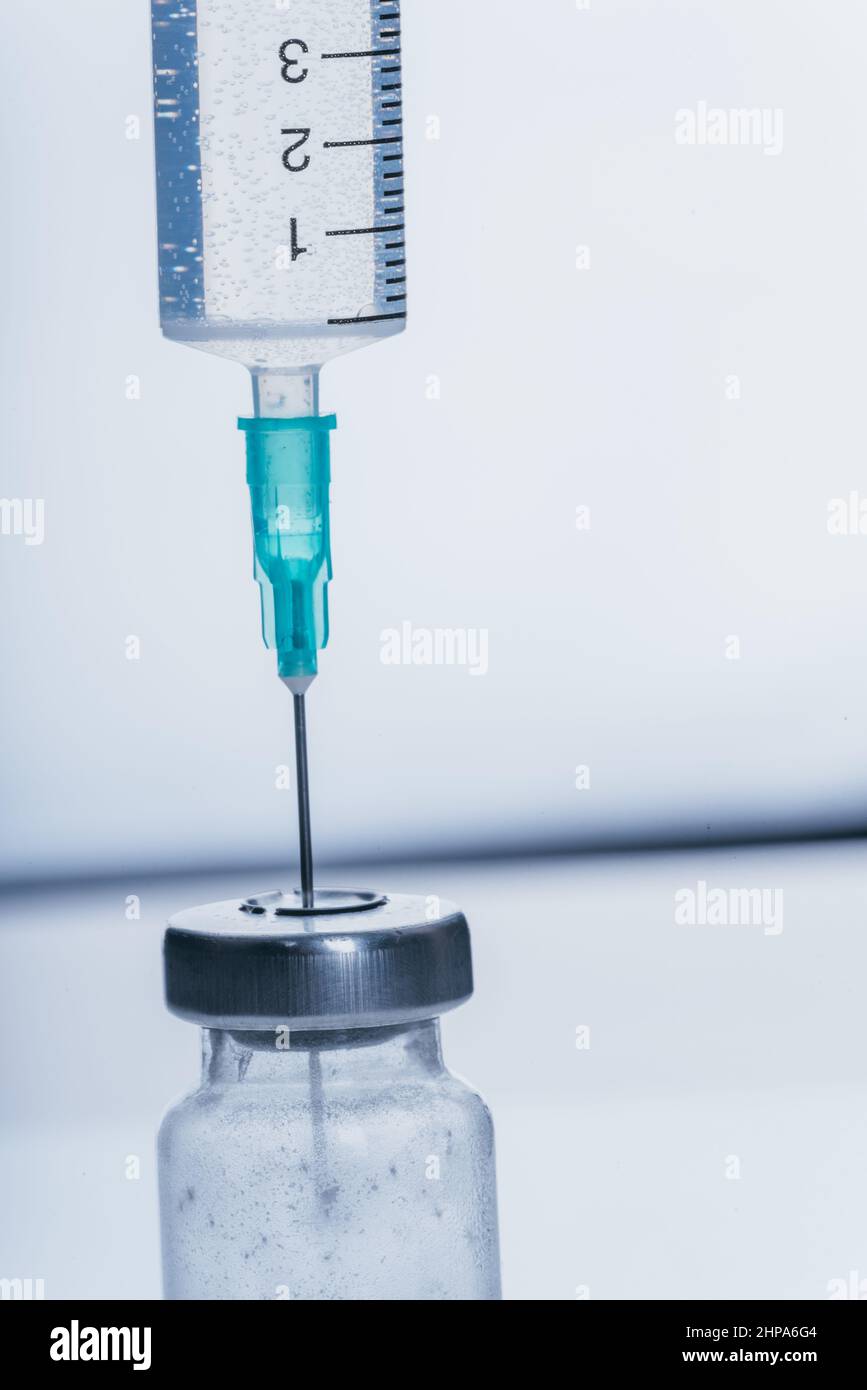 Medicine, Injection, vaccine and disposable syringe, drug concept ...