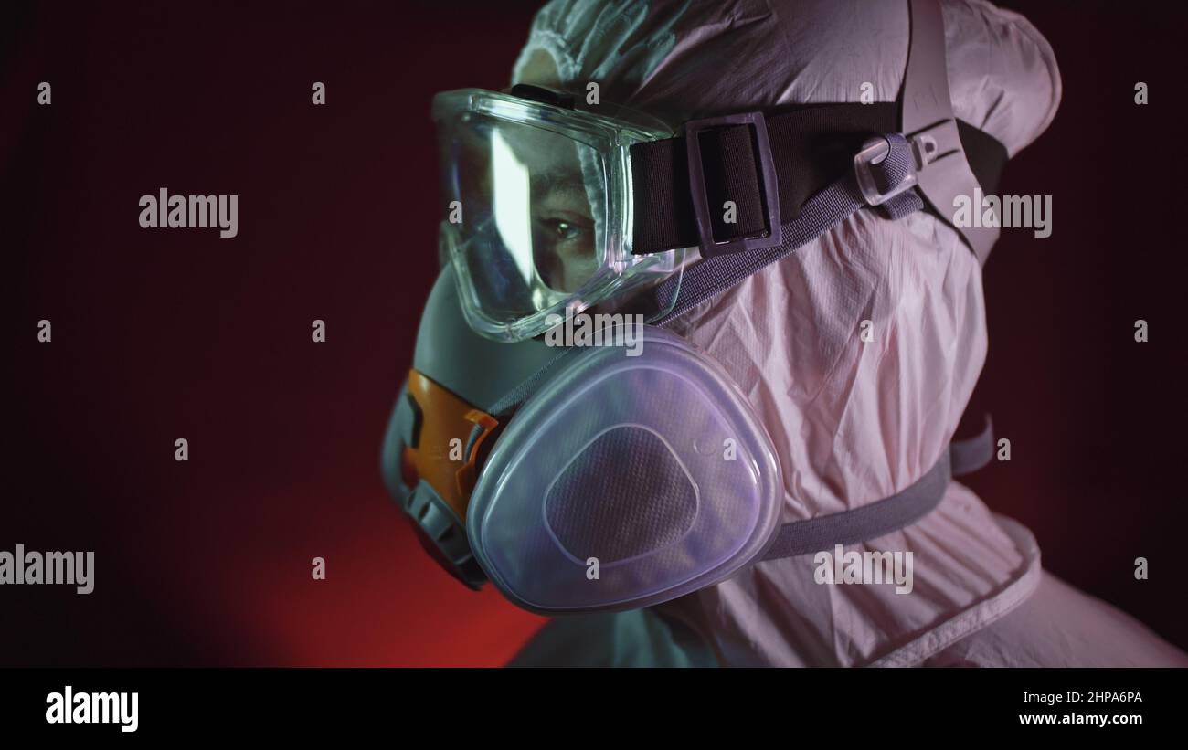 Man in protective costume suit, gas protect medical antibacterial ...