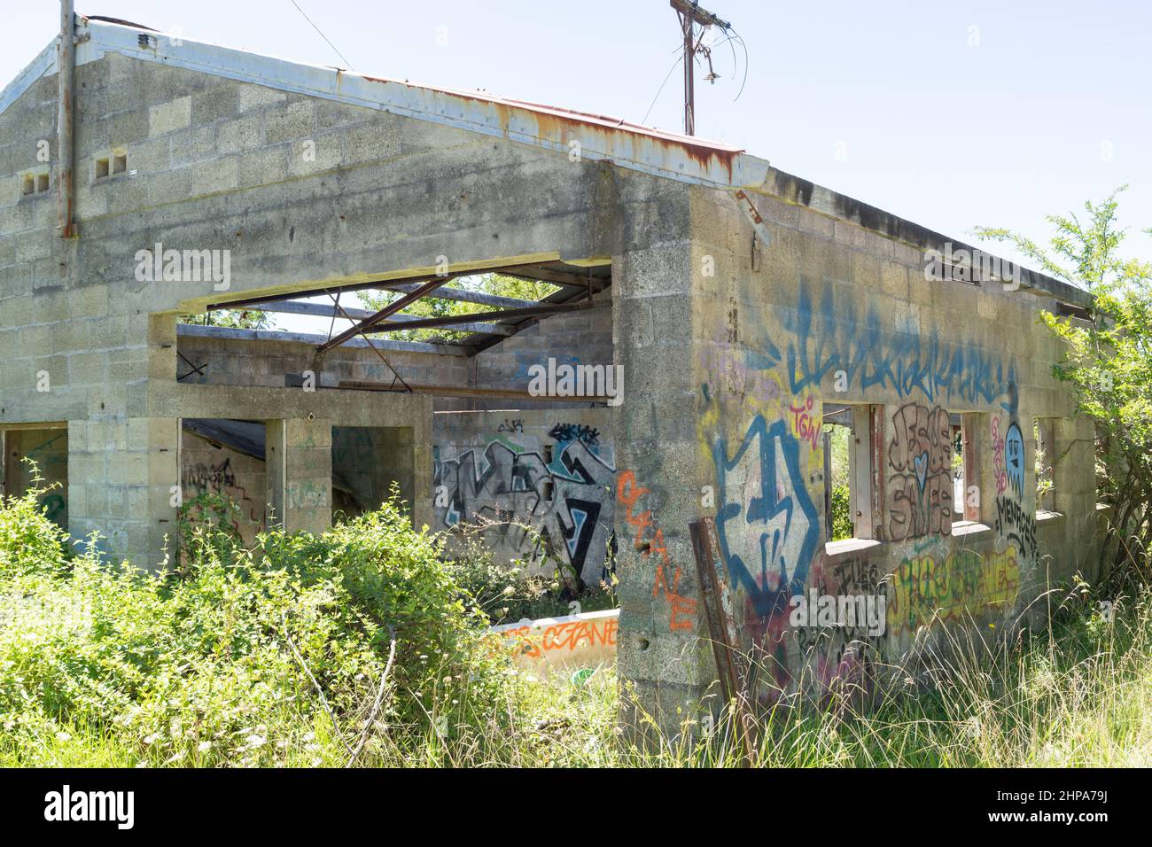 Ruatoria New Zealand - February 4 2022; Graffiti covered derelict ...
