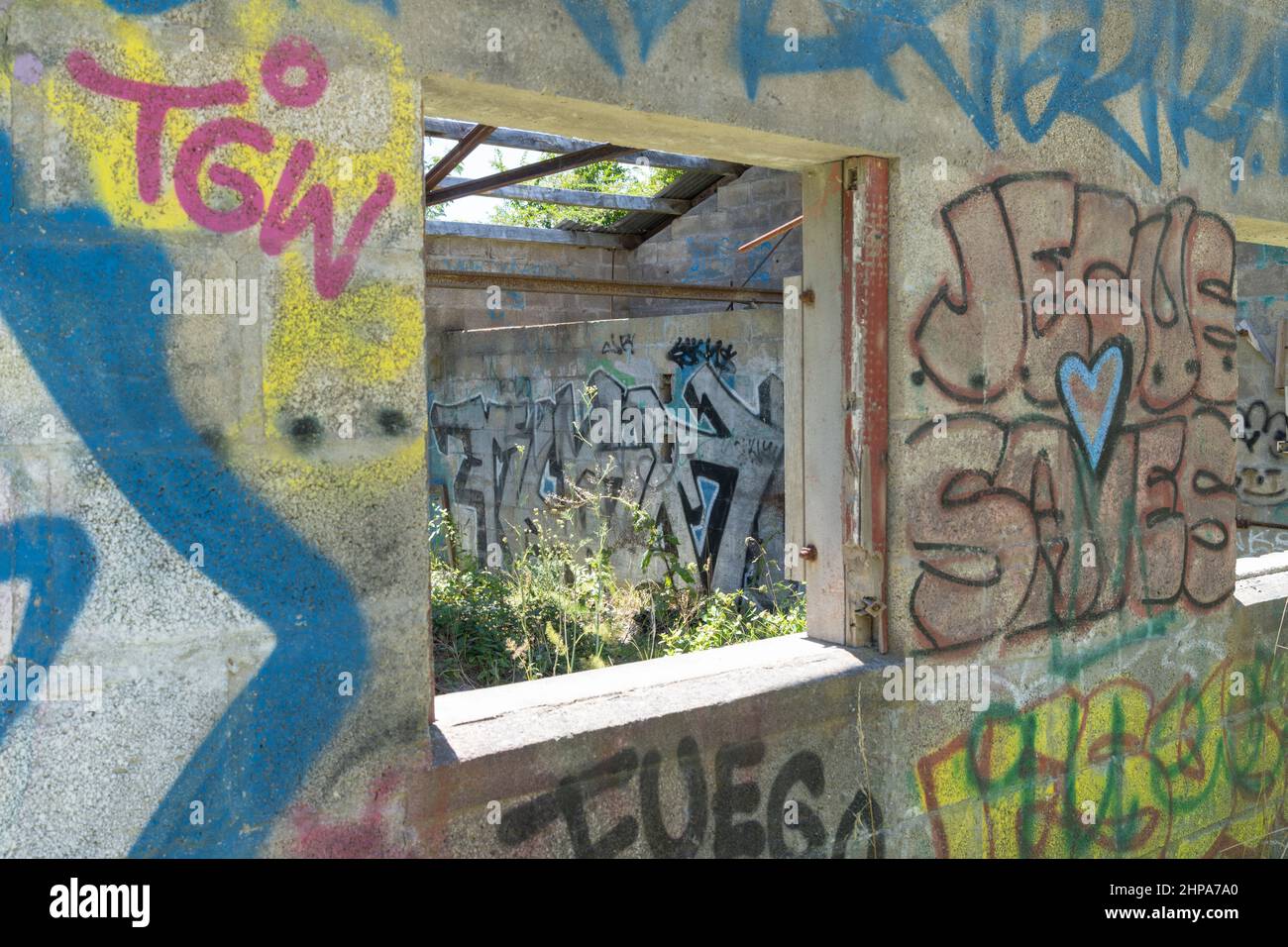 Ruatoria New Zealand - February 4 2022; Graffiti covered derelict ...