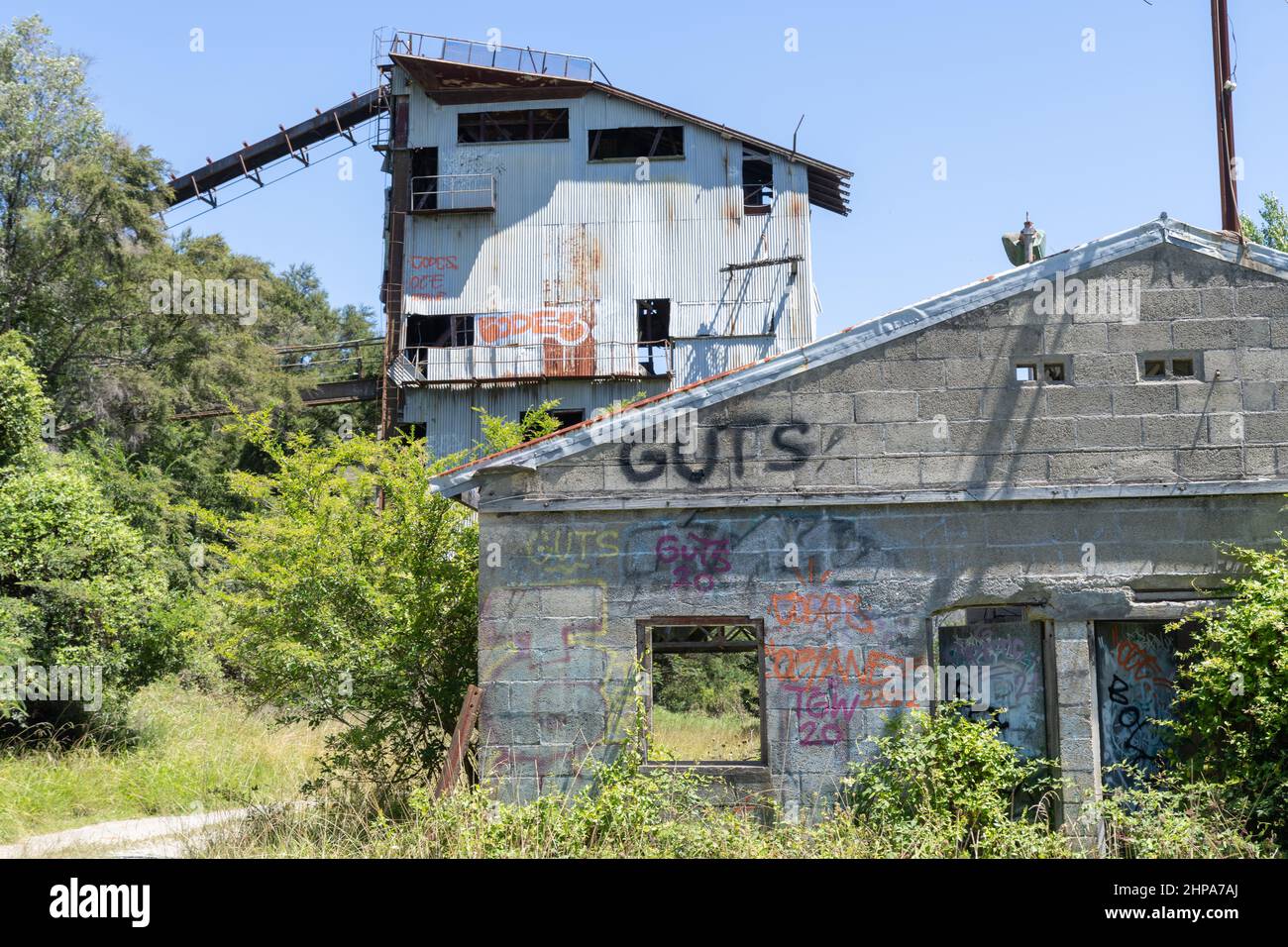 Ruatoria New Zealand - February 4 2022; Graffiti covered derelict ...
