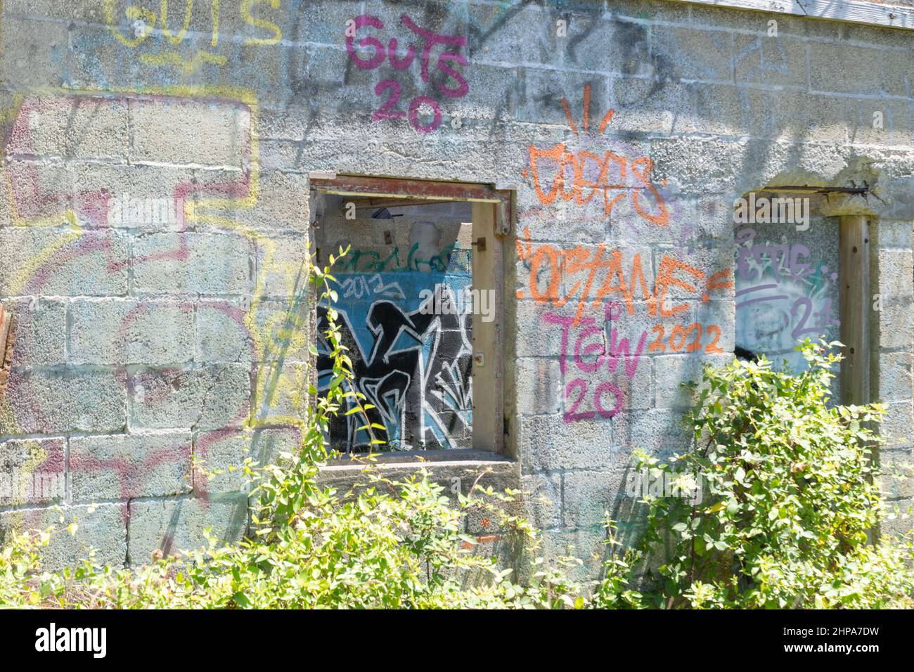 Ruatoria New Zealand - February 4 2022; Graffiti covered derelict ...