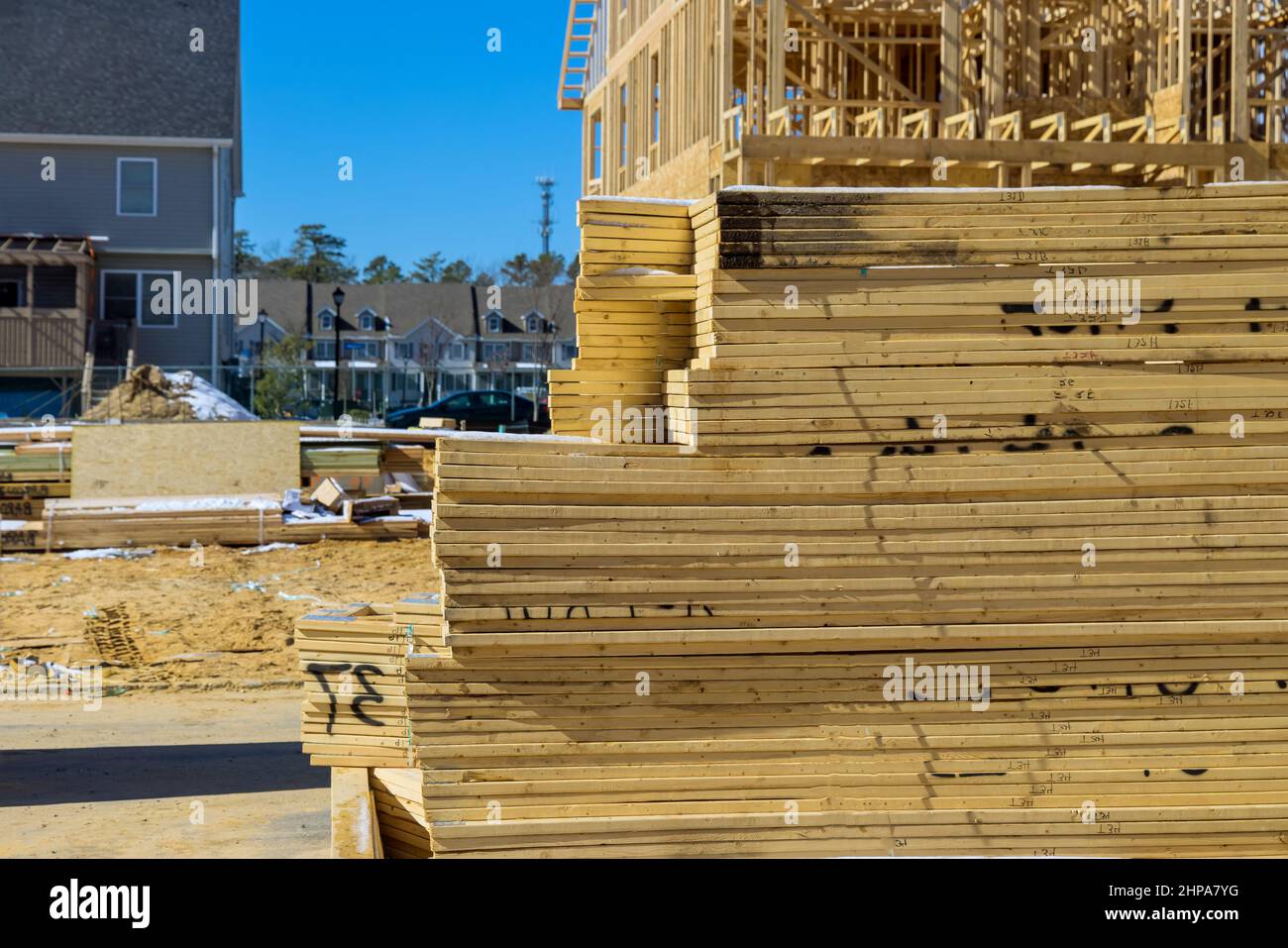 Stacked wooden timber for trusses for roof near construction site Stock ...
