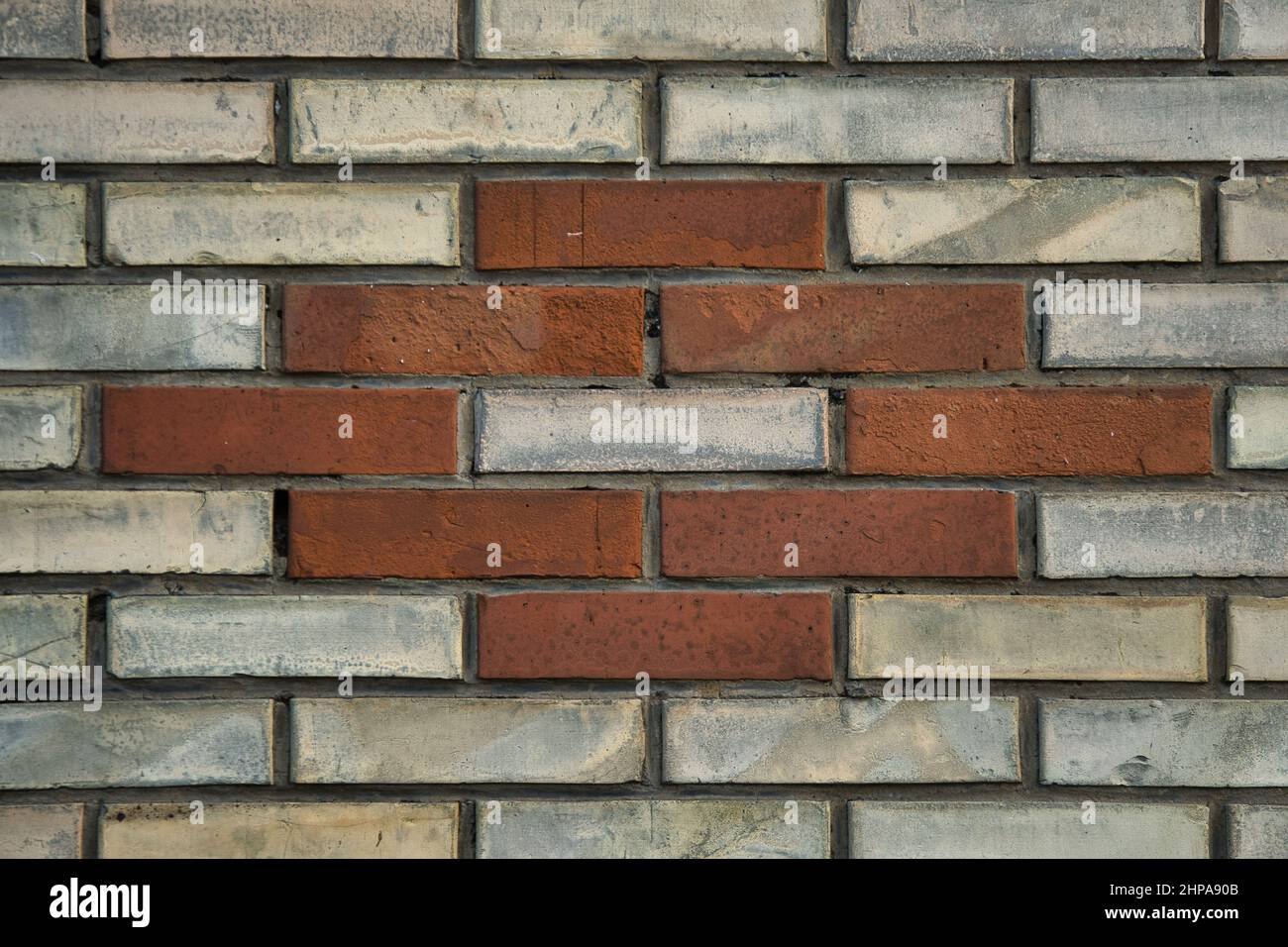 Closeup of hand-moulded bricks and in the middle forming a diamond ...