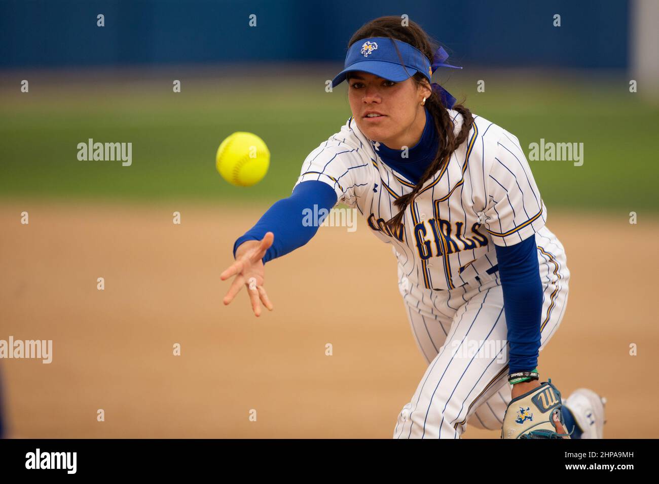 Tosses first ball hi-res stock photography and images - Alamy