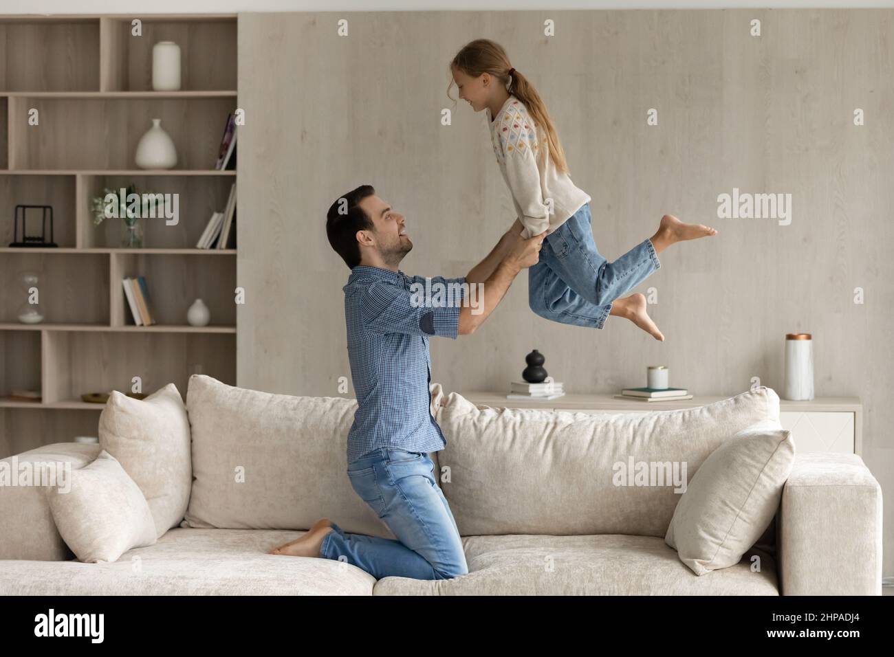 Daddy lifting daughter hi-res stock photography and images - Alamy