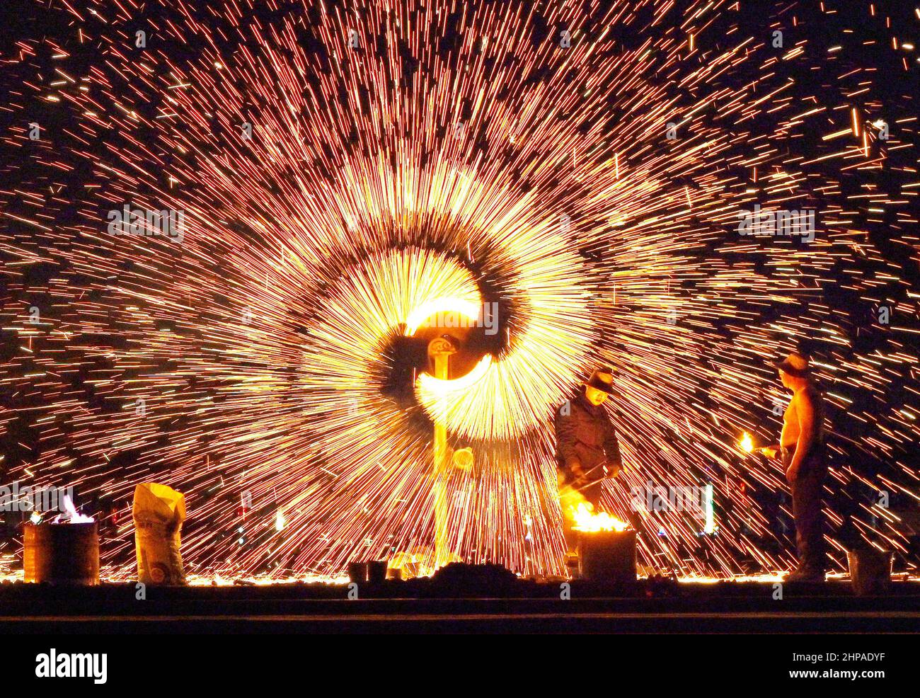 BAZHOU, CHINA - FEBRUARY 19, 2022 - A folk artist performs a thousand ...