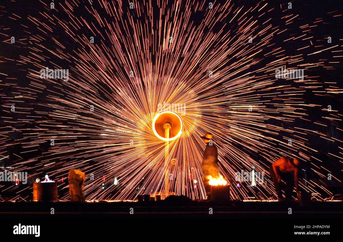 BAZHOU, CHINA - FEBRUARY 19, 2022 - A folk artist performs a thousand ...