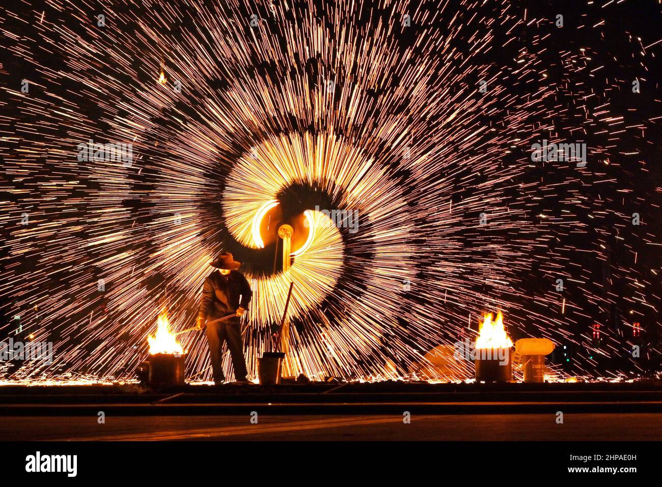 BAZHOU, CHINA - FEBRUARY 19, 2022 - A folk artist performs a thousand ...