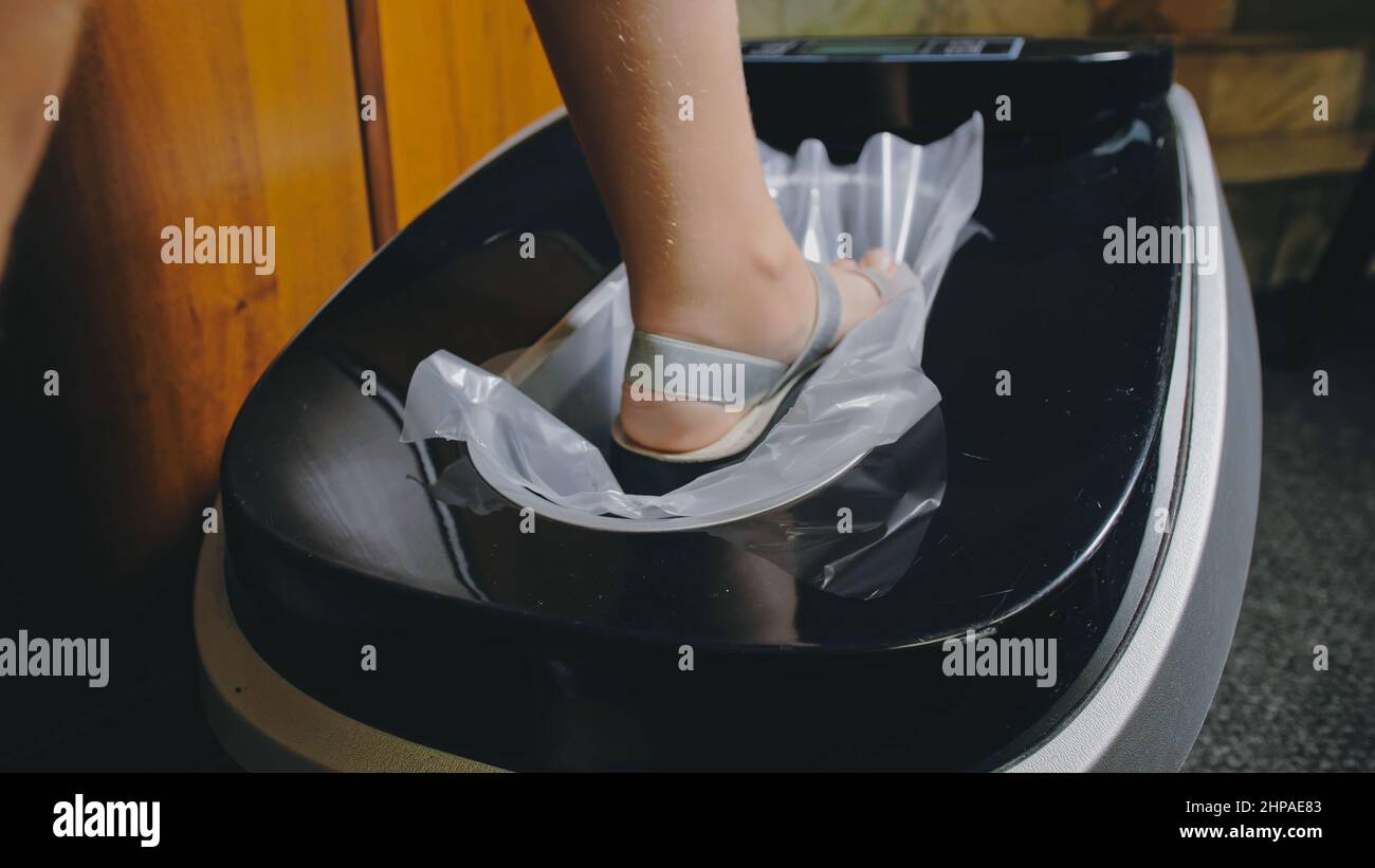 Automatic Thermal Shrinkable Shoe Cover Laminating Machine. Close up ...