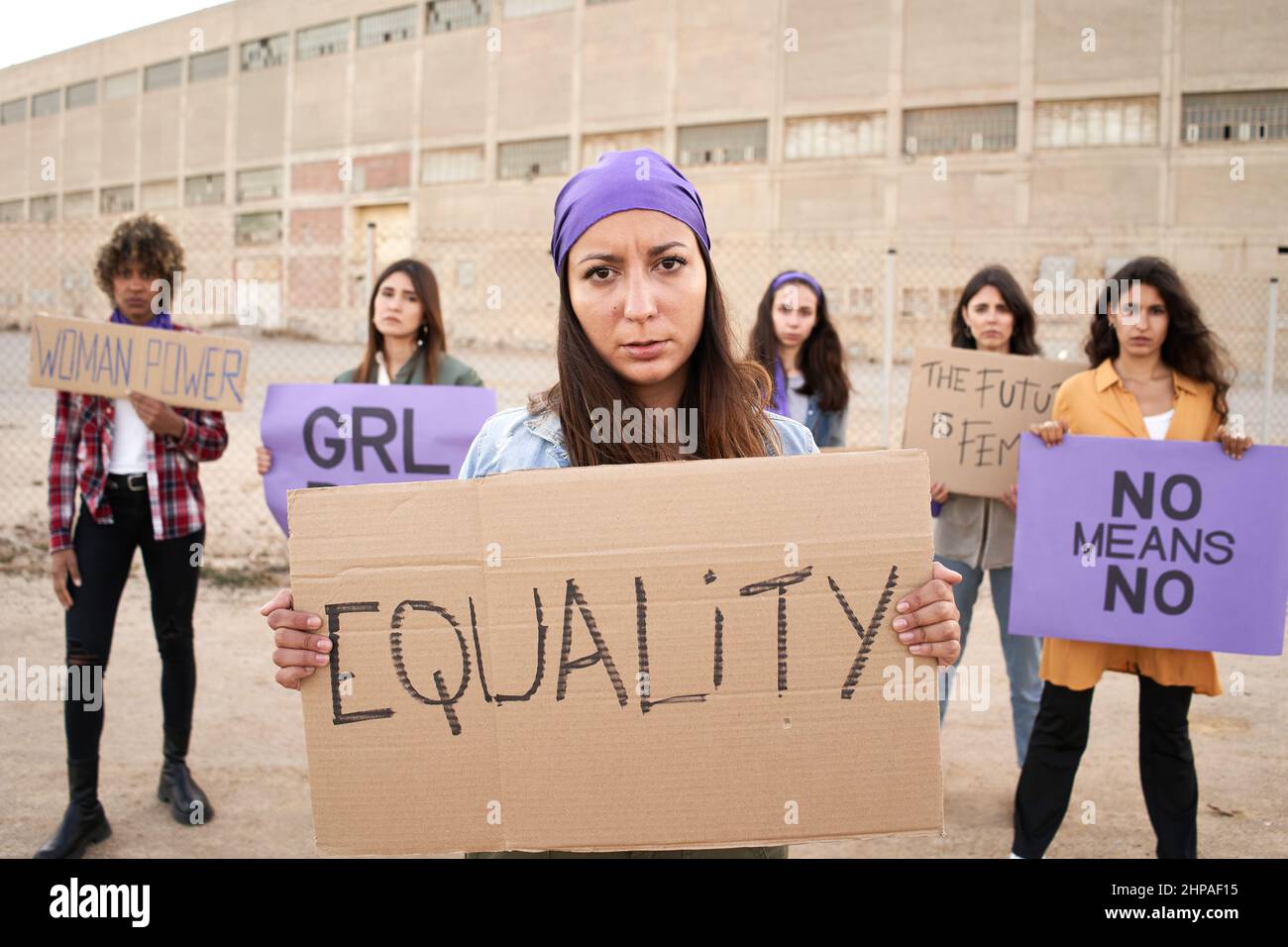 Feminist with a banner at a protest. Women activist demonstration Stock ...