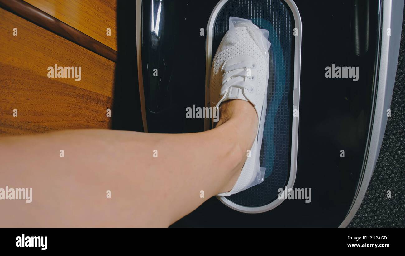 Automatic Thermal Shrinkable Shoe Cover Laminating Machine. Close up ...