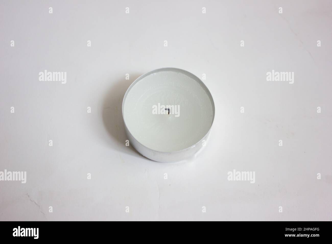 small scented candle isolated on white background Stock Photo - Alamy