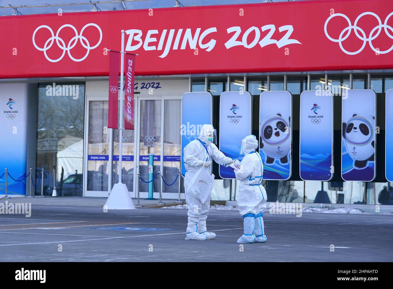 Olympic staff with hazmat suits outside the National Aquatics Centre in ...