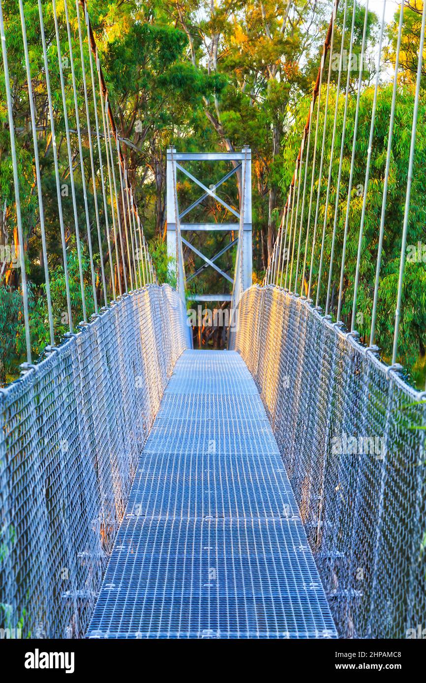 Suspension bridge across Murrumbidgee river in Balranald outback town ...