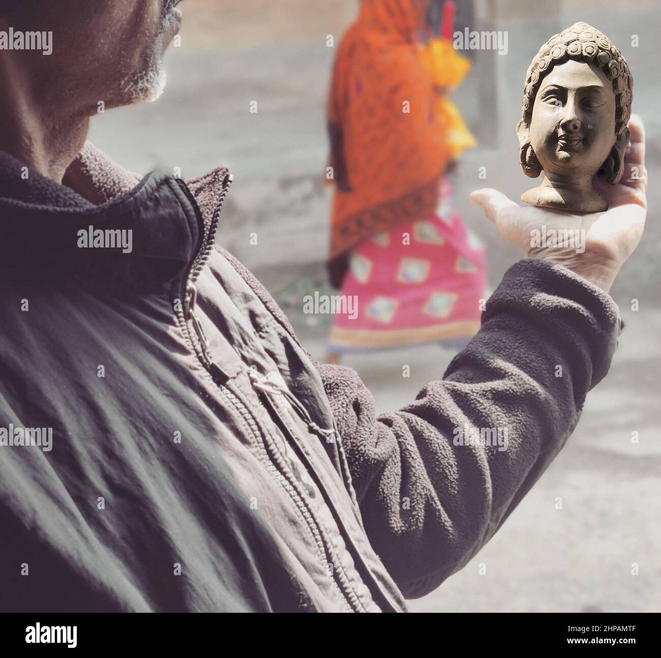 An artist showing his artwork of Goddess durga idol head Stock Photo ...