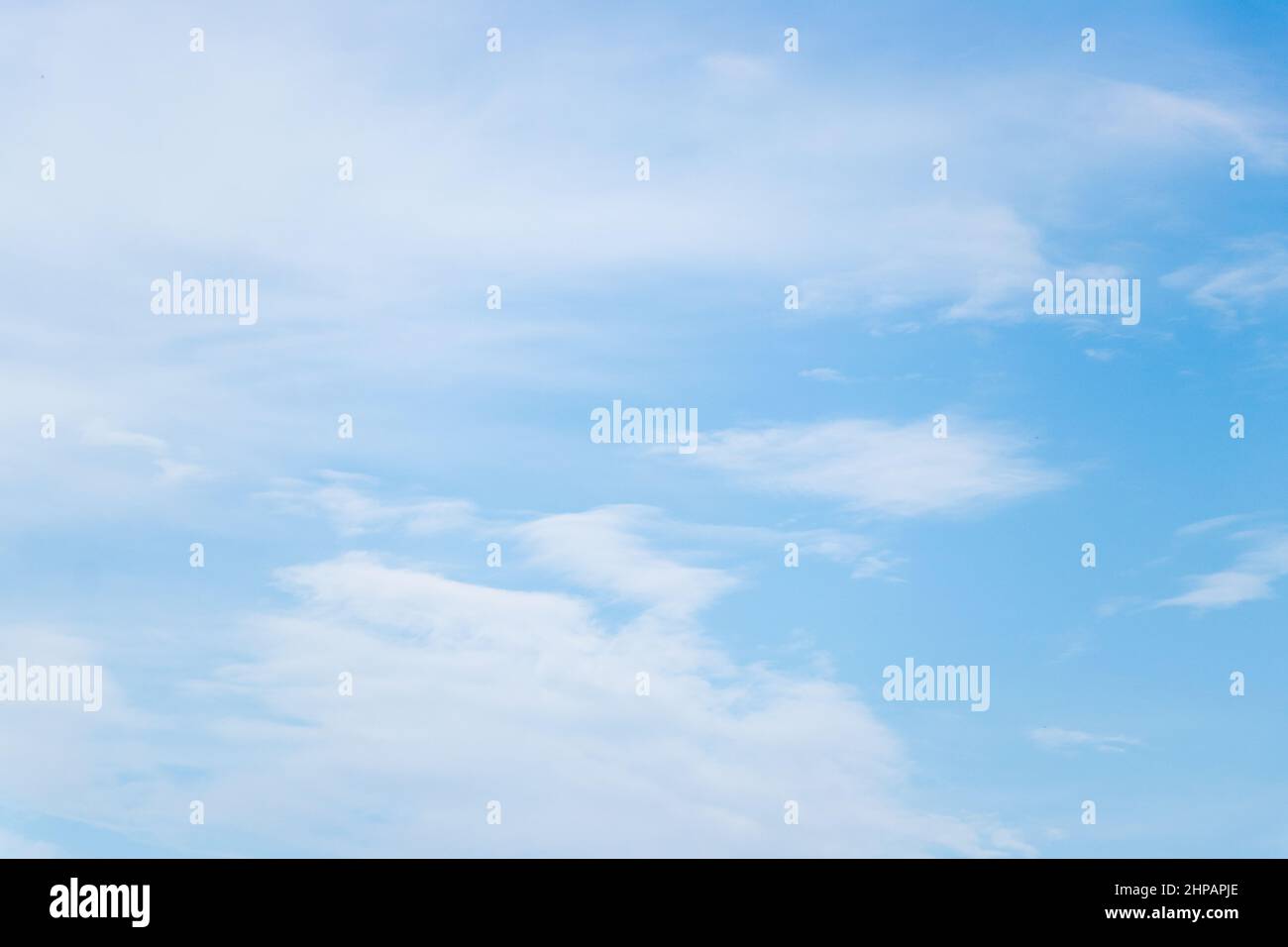 Clear blue color sky with white cloud background Stock Photo - Alamy