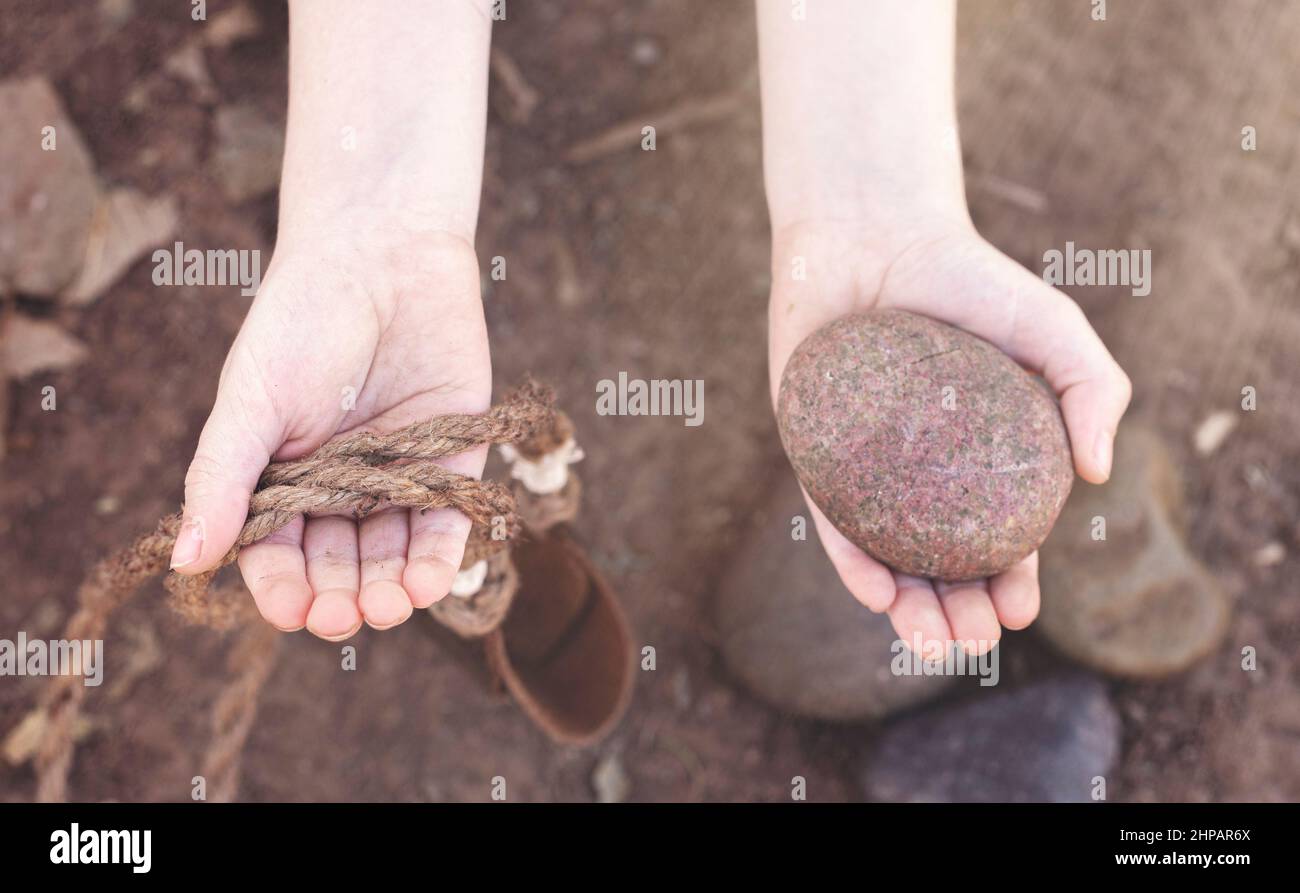 David Holding a Sling and a Stone Out Before He goes to Slay Goliath ...