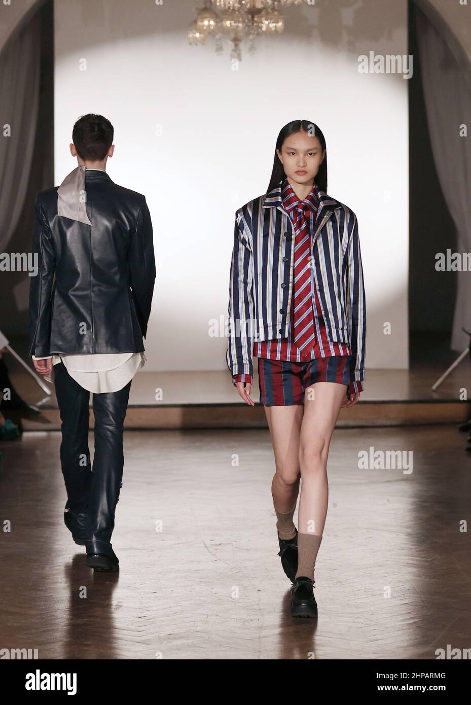 London, Britain. 19th Feb, 2022. Models present creations of DANIEL w ...
