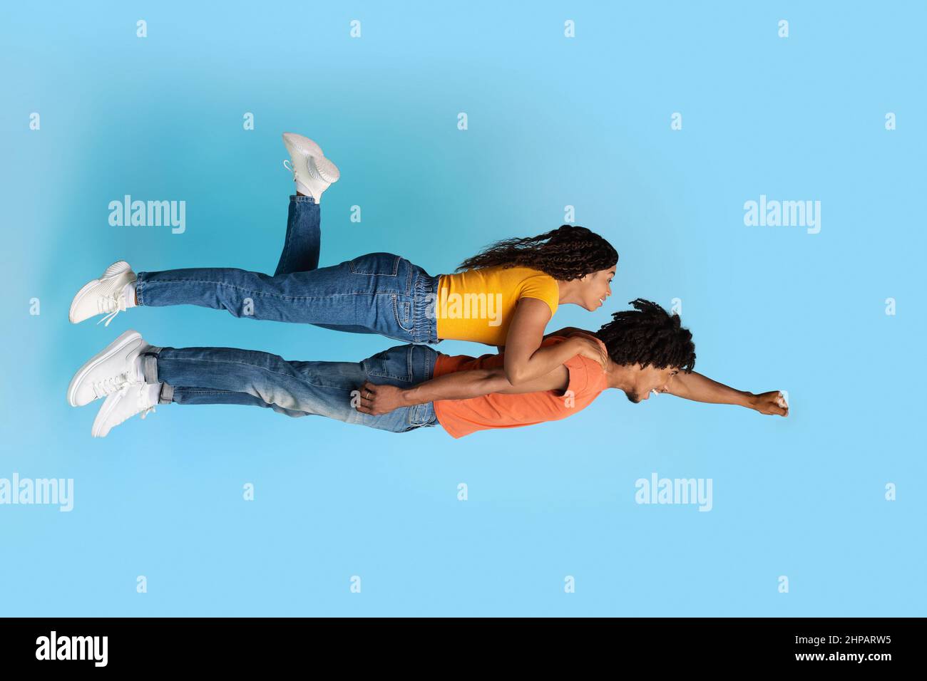 Couple flying hi-res stock photography and images - Alamy
