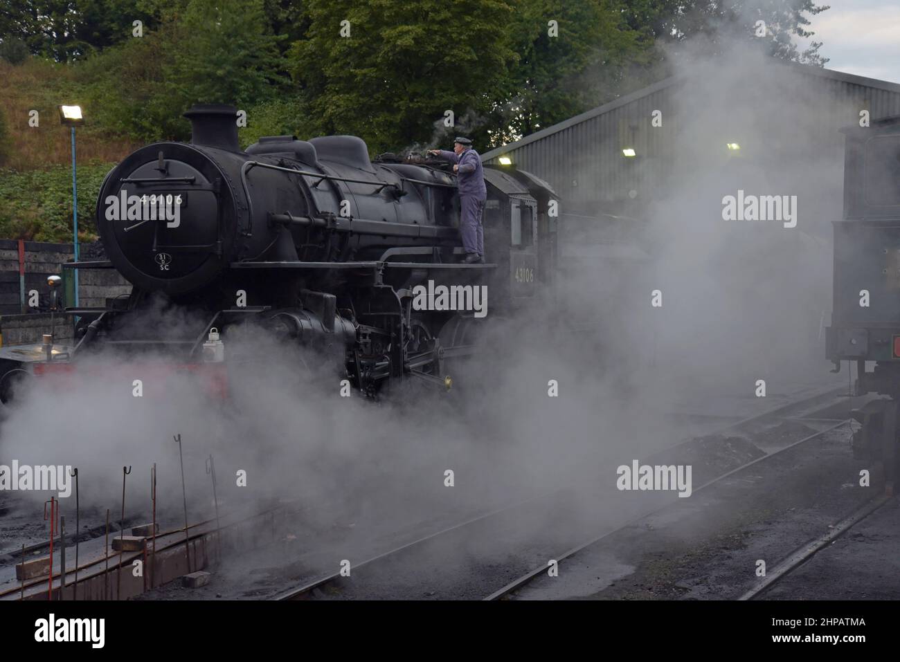 Train driver performs early morning checks on Ex LMS steam loco 43106 ...