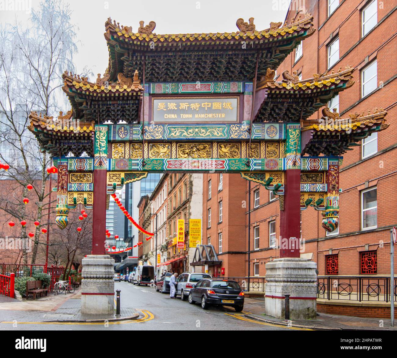 Chinatown archway/gate decorated with dragons & pheonixes can be seen ...