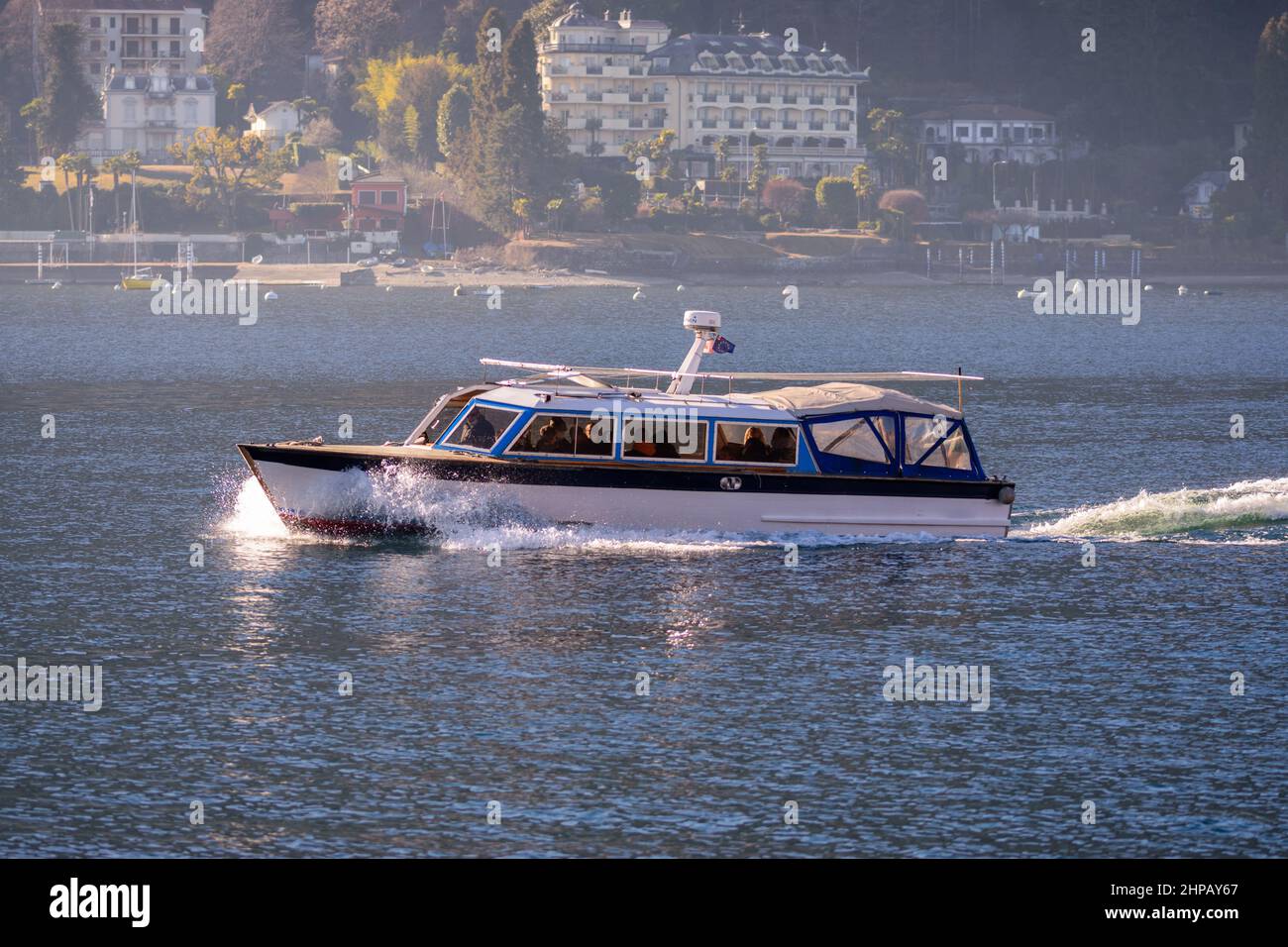 Tourist boat traveling from Stresa on Lake Maggiore in Italy Stock ...