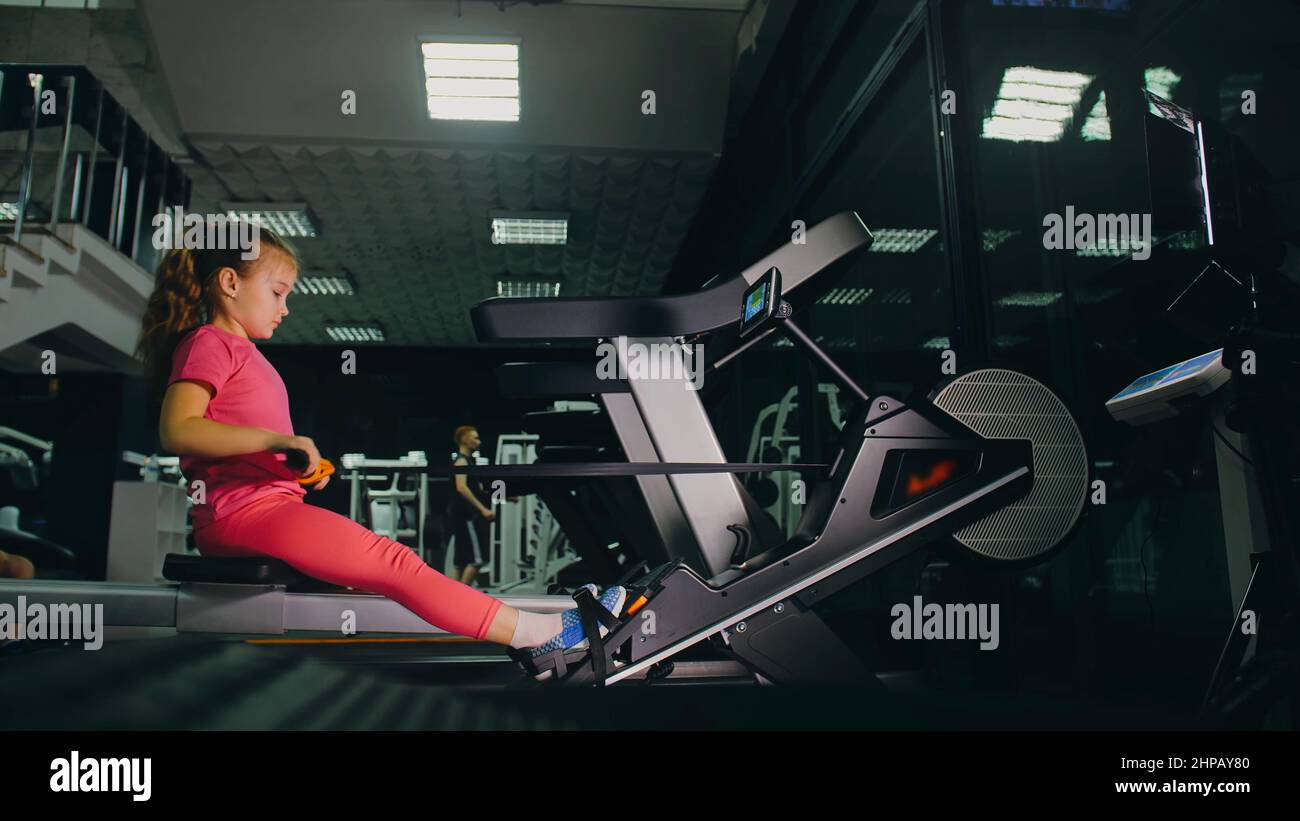Teen girl gym machine hi-res stock photography and images - Alamy