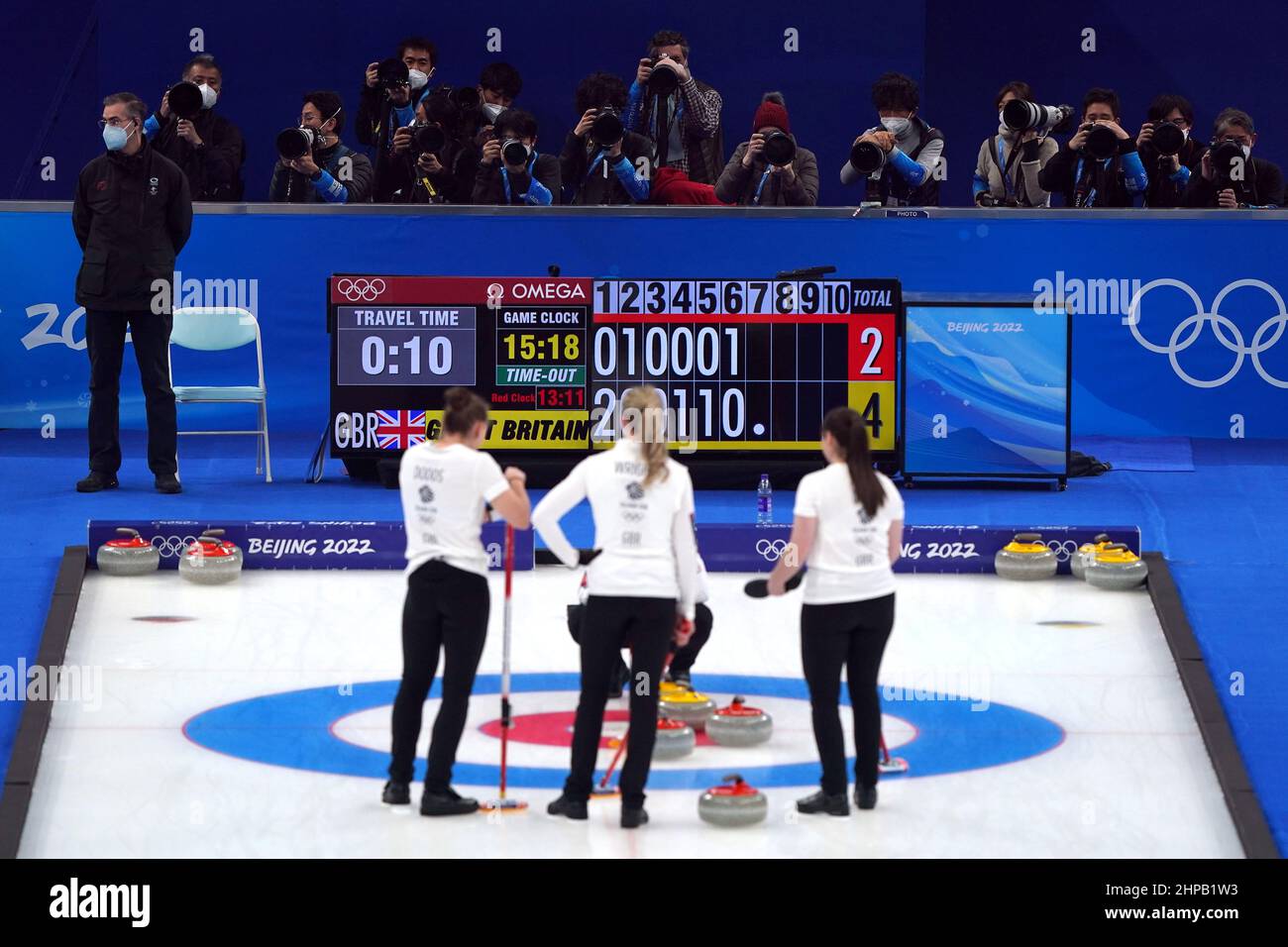 Photographers during the Women's Curling Gold Medal match on day ...