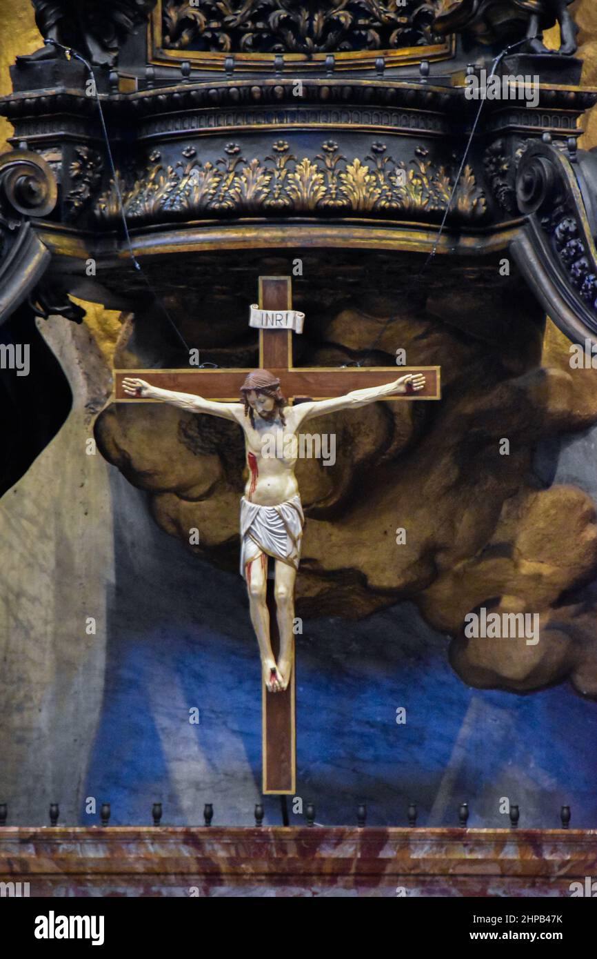 Vertical shot of the statue of crucified Jesus Stock Photo - Alamy