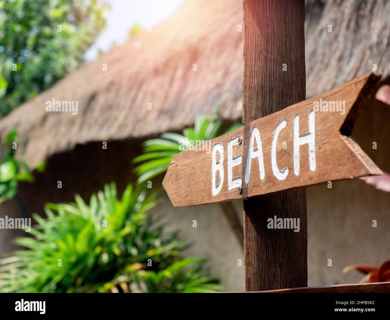 Beach way sign. White text, beach on the wooden signage or signpost ...