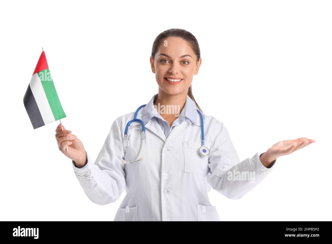Female doctor with flag of UAE on white background Stock Photo - Alamy