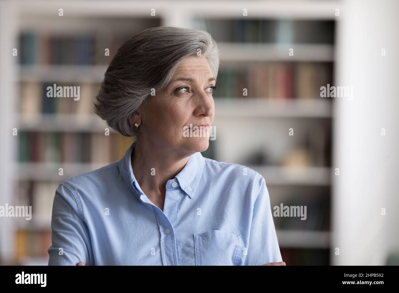 Happy dreamy pensive old woman looking in distance Stock Photo - Alamy