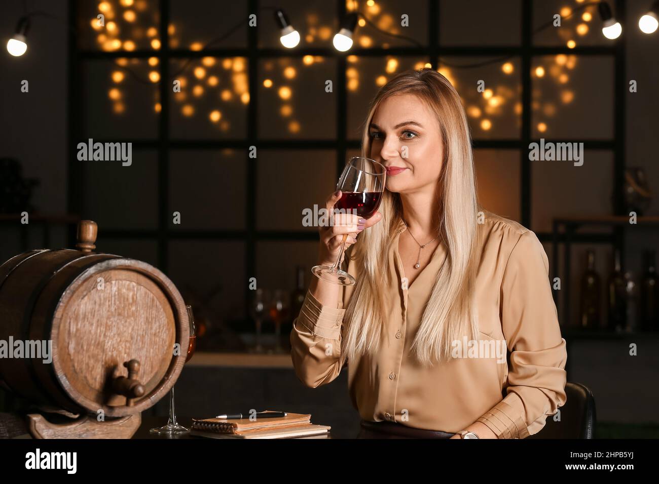 Female sommelier tasting types of wine Stock Photo - Alamy
