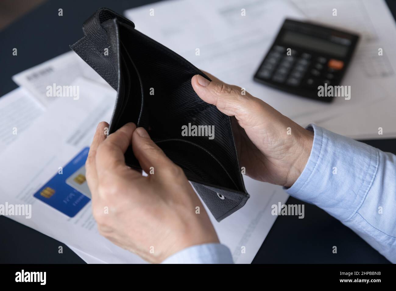 Close up view old woman opening empty wallet Stock Photo - Alamy