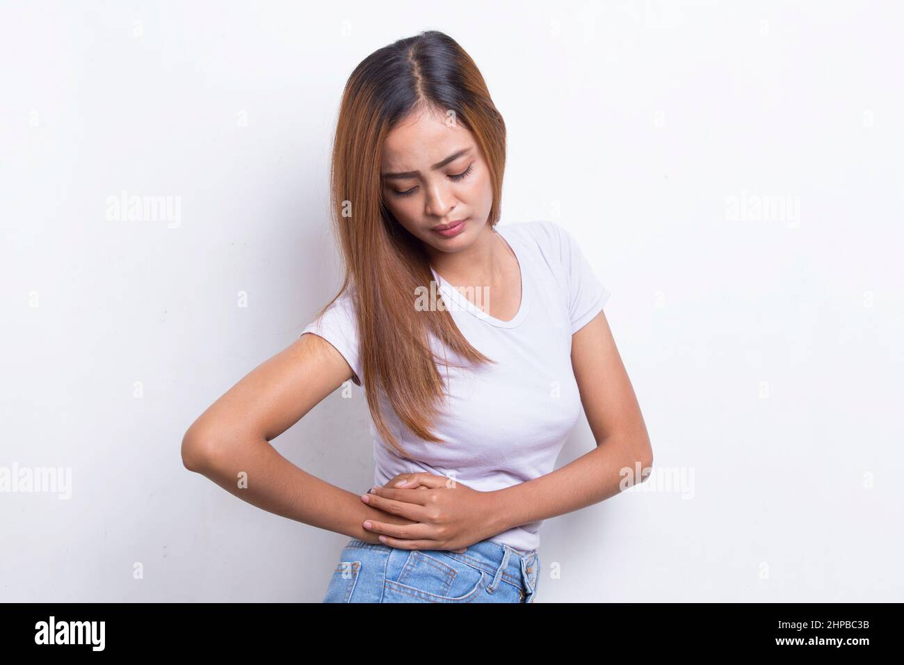Young asian woman suffering low back pain and waist lumbar pain Stock ...
