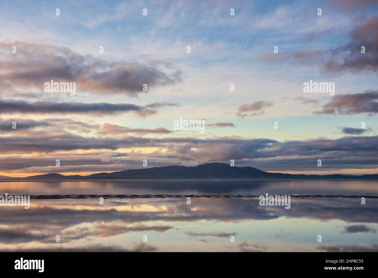 Epic sunset landscape image of Solway Firth viewed from Silloth during ...