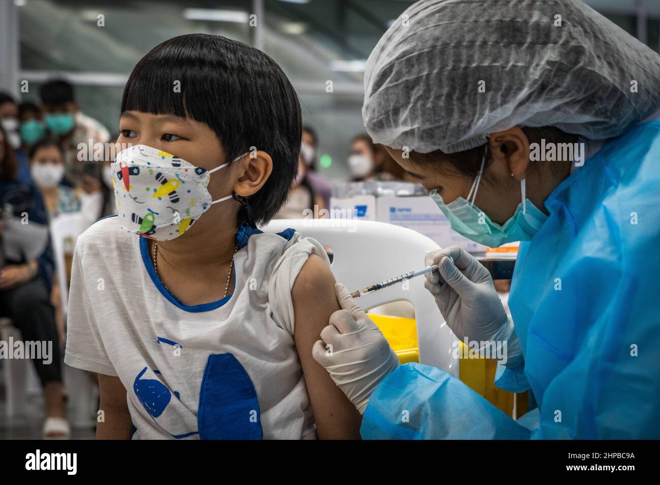 A young boy receives the Pfizer-BioNTech COVID-19 vaccine.Children aged ...