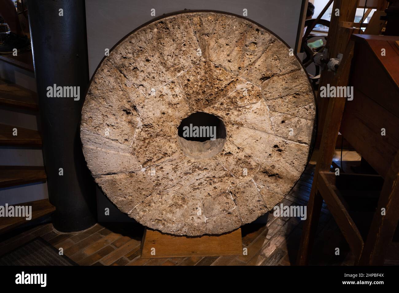 Old grain mill grinding stone hi-res stock photography and images - Alamy