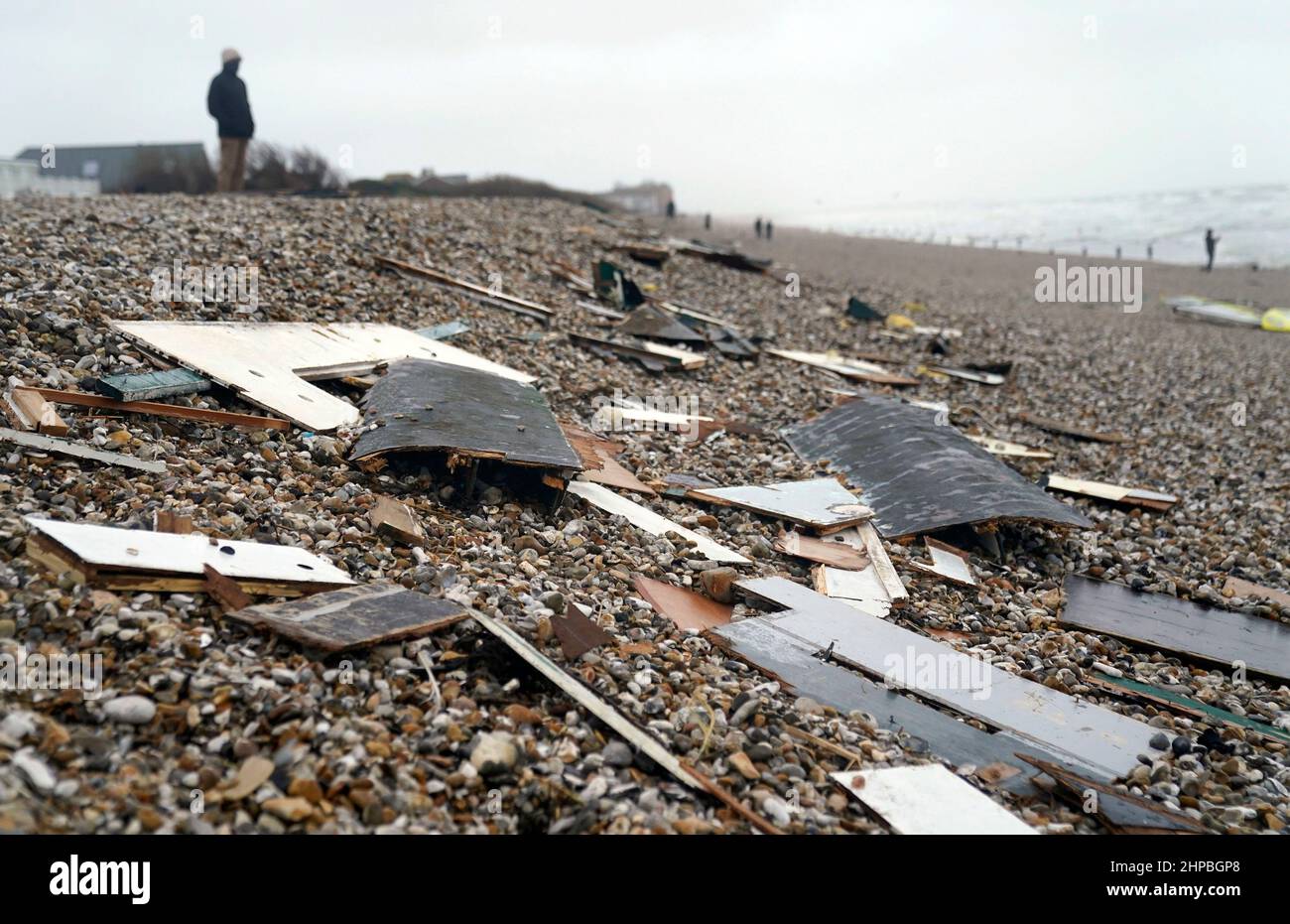 Debris is seen on the beach in Bracklesham Bay in West Sussex ...