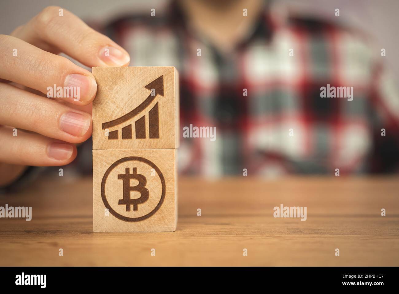 Concept of bitcoin growth. BTC graph of the growth symbols on a wooden ...