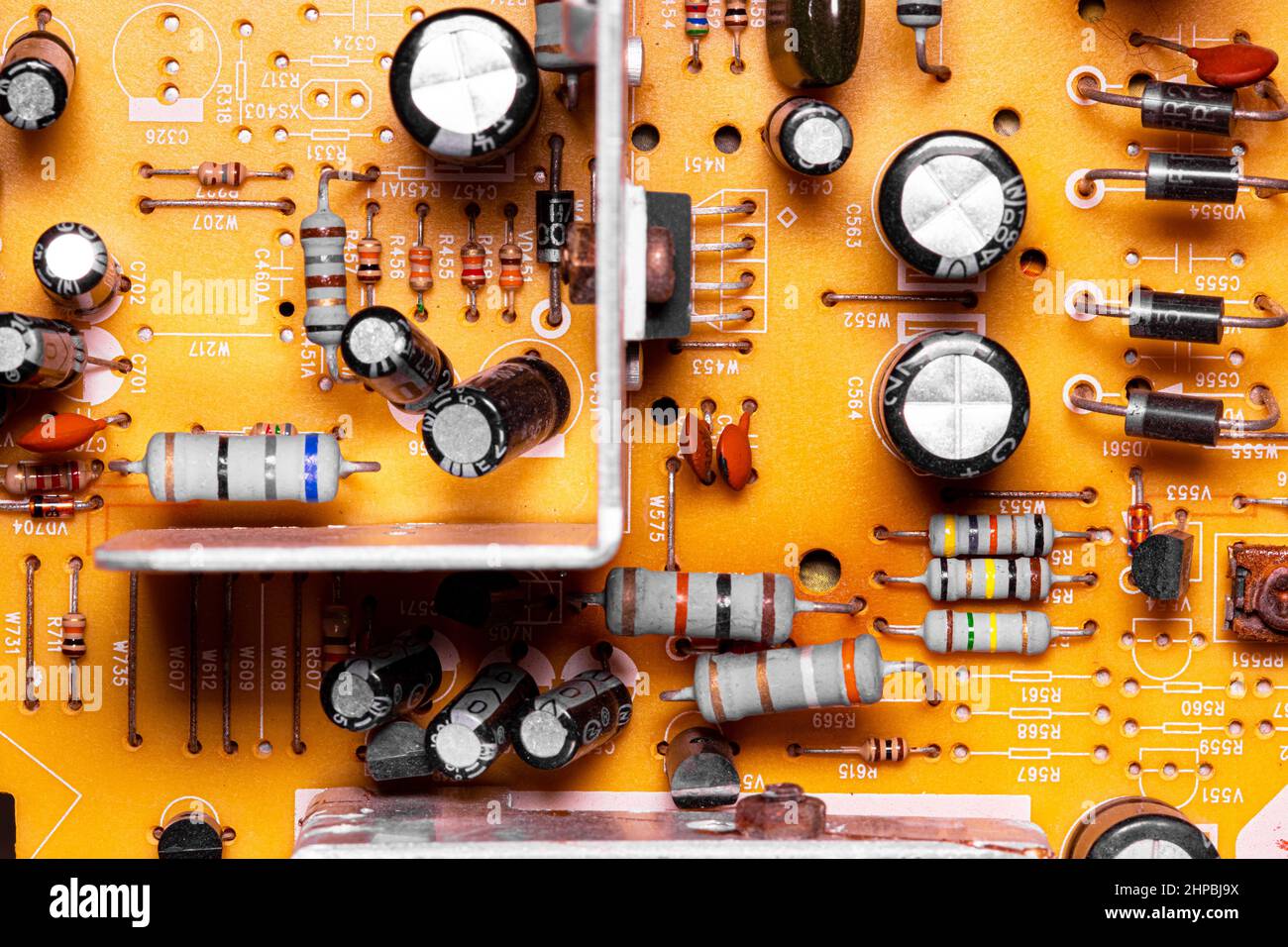 Macro Close up of components and microchips on old PC circuit board ...