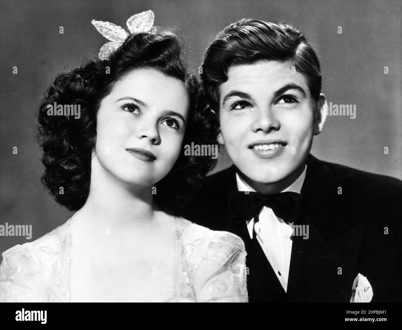 SHIRLEY TEMPLE and DICKIE MOORE in MISS ANNIE ROONEY (1942), directed ...