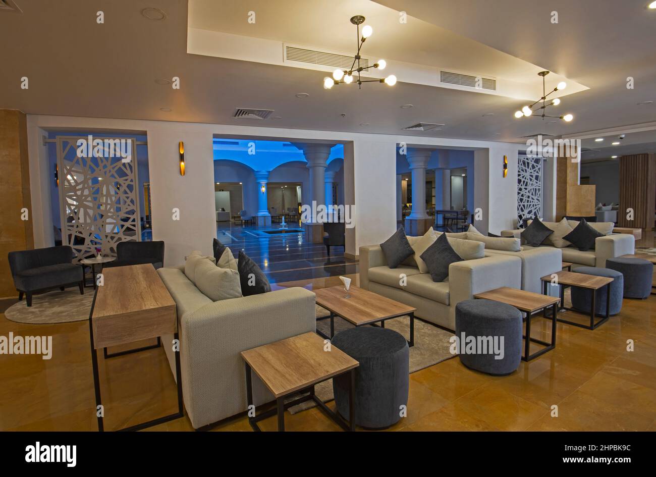 Interior design of a luxury hotel resort lobby reception area with ...