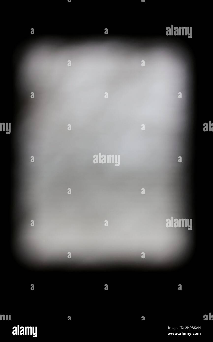 Dreamy blurry view of a white rectangle on a black background Stock ...