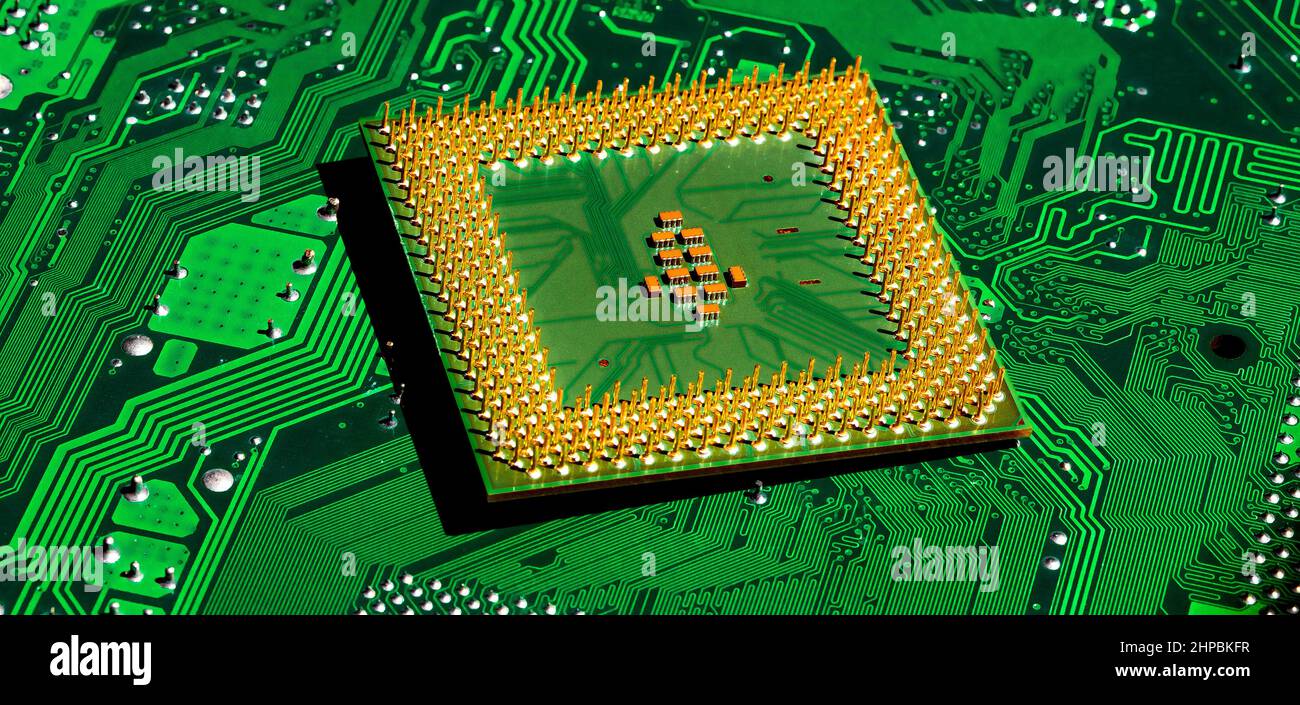 Macro Close up of microchips and pins on Main CPU PC processor circuit board Stock Photo - Alamy