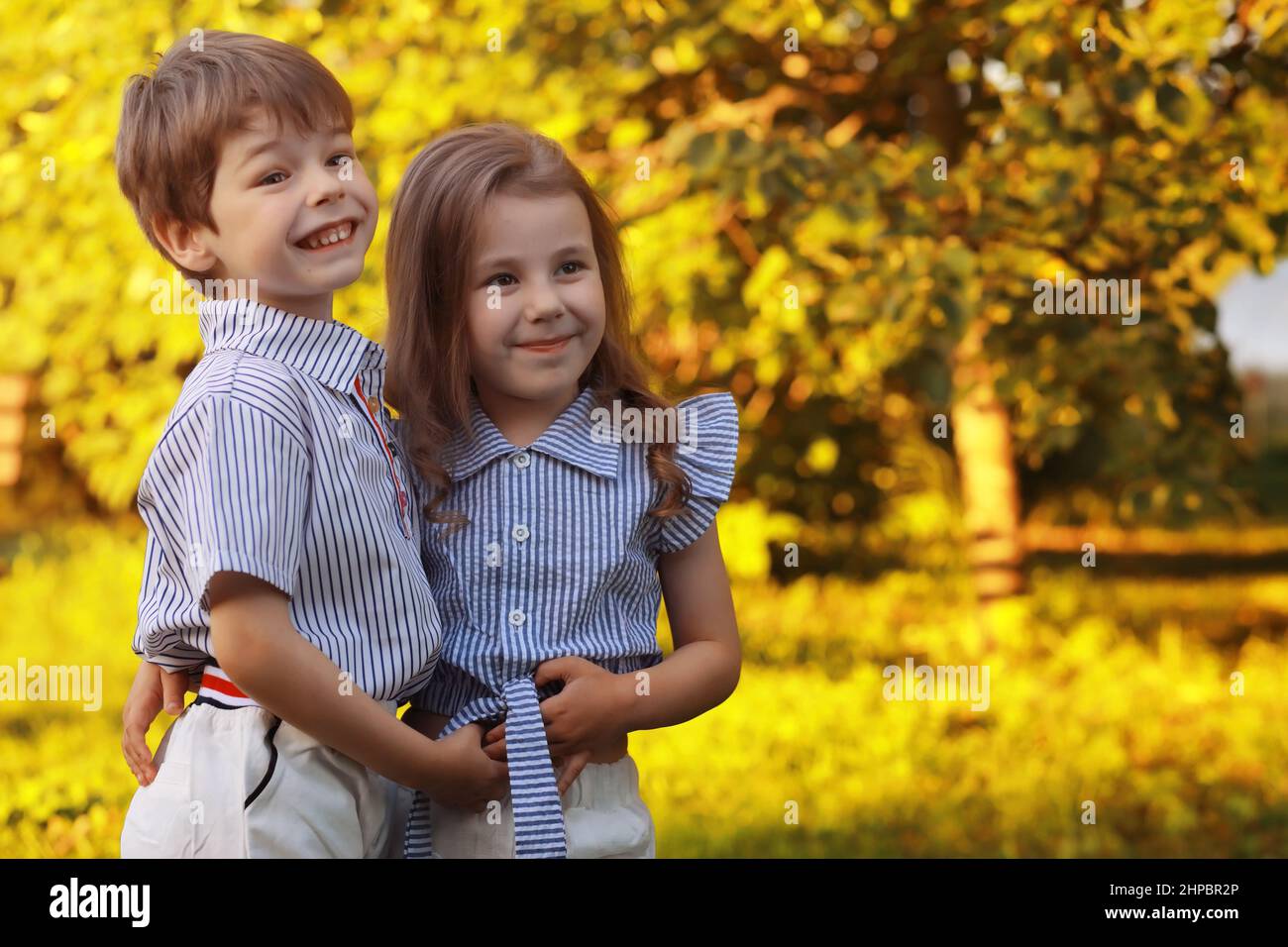 Children on a walk in the summer. Children indulge in country. Laughter ...