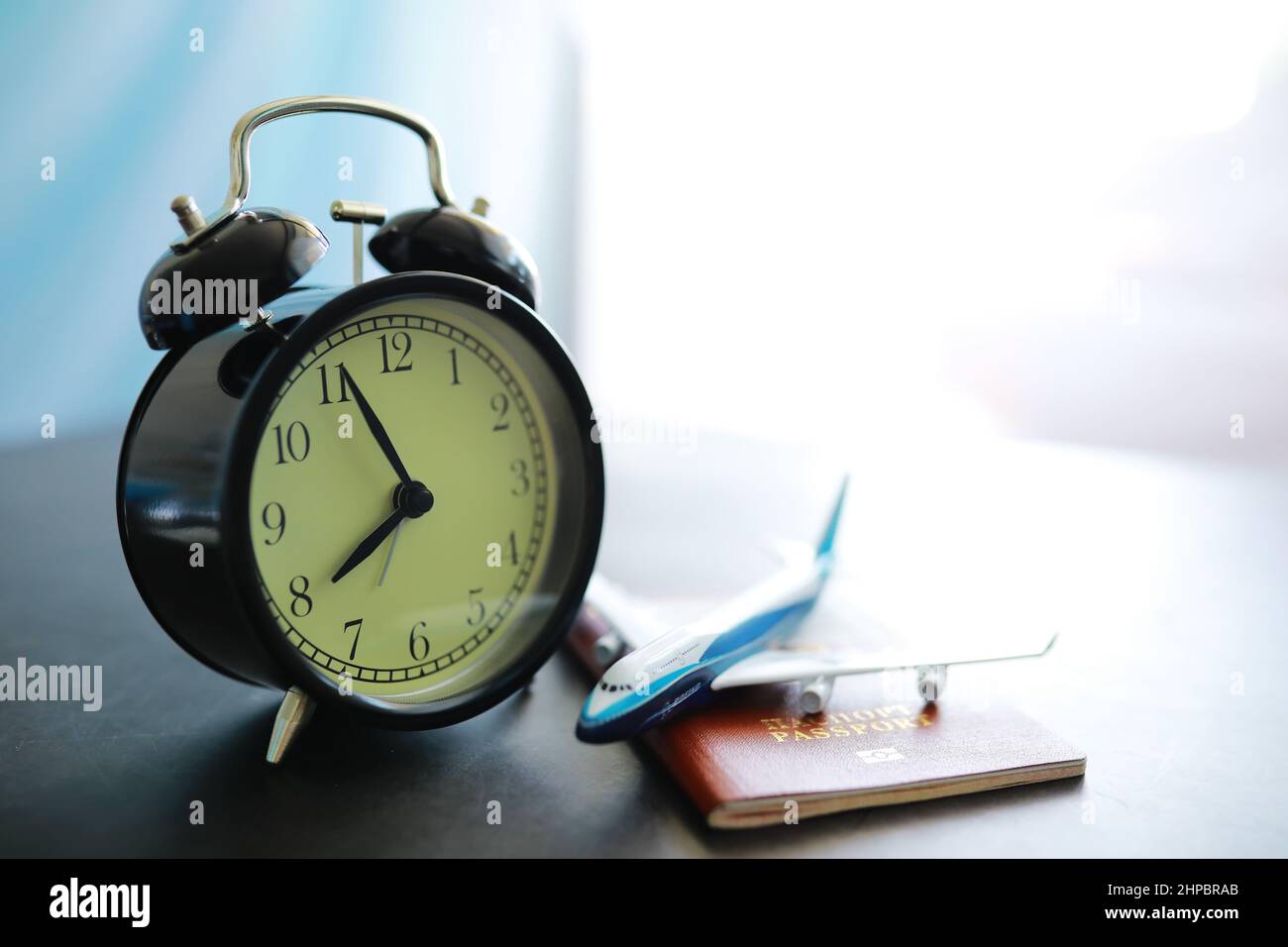 Big alarm clock. The clock is on table. The inscription "time". Time ...